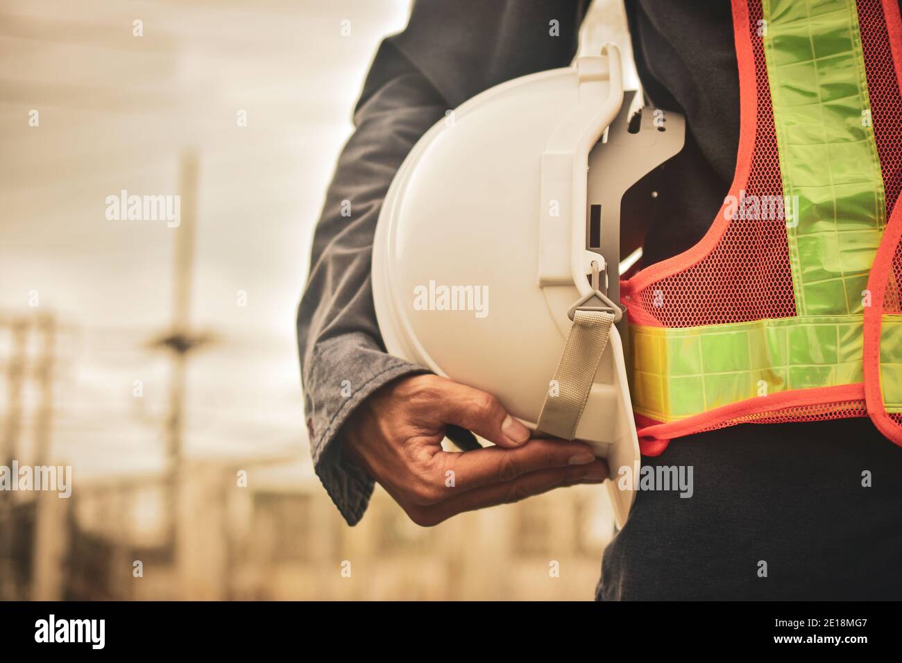 Close up hand holding white helmet hard hat Engineering concept Stock ...