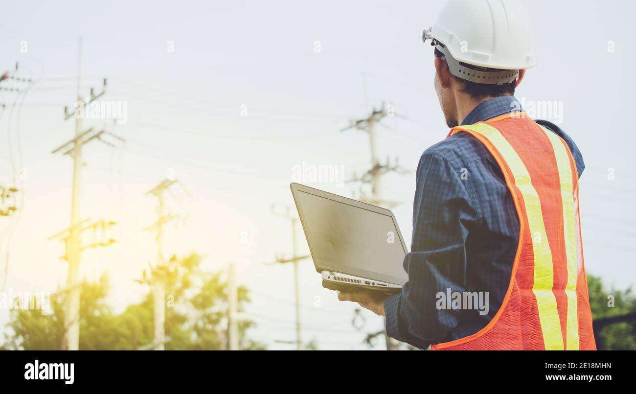 Electrician engineer High voltage post or high voltage tower background ...