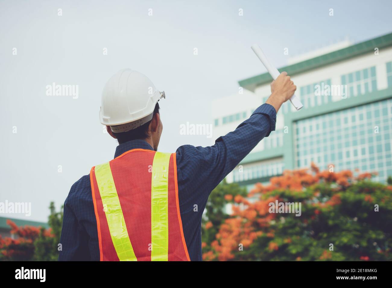 Engineering helmet and Construction of building house or skyscraper ...