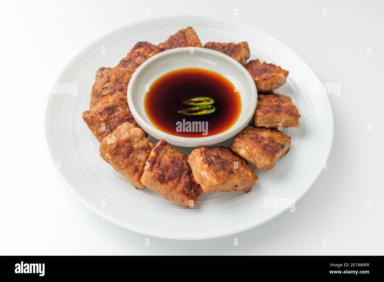 Meat bandit on white background Stock Photo - Alamy