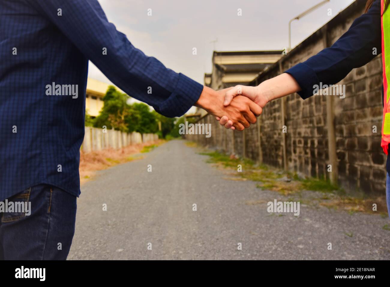 Business people shake hands successful project at workplace outdoor ...