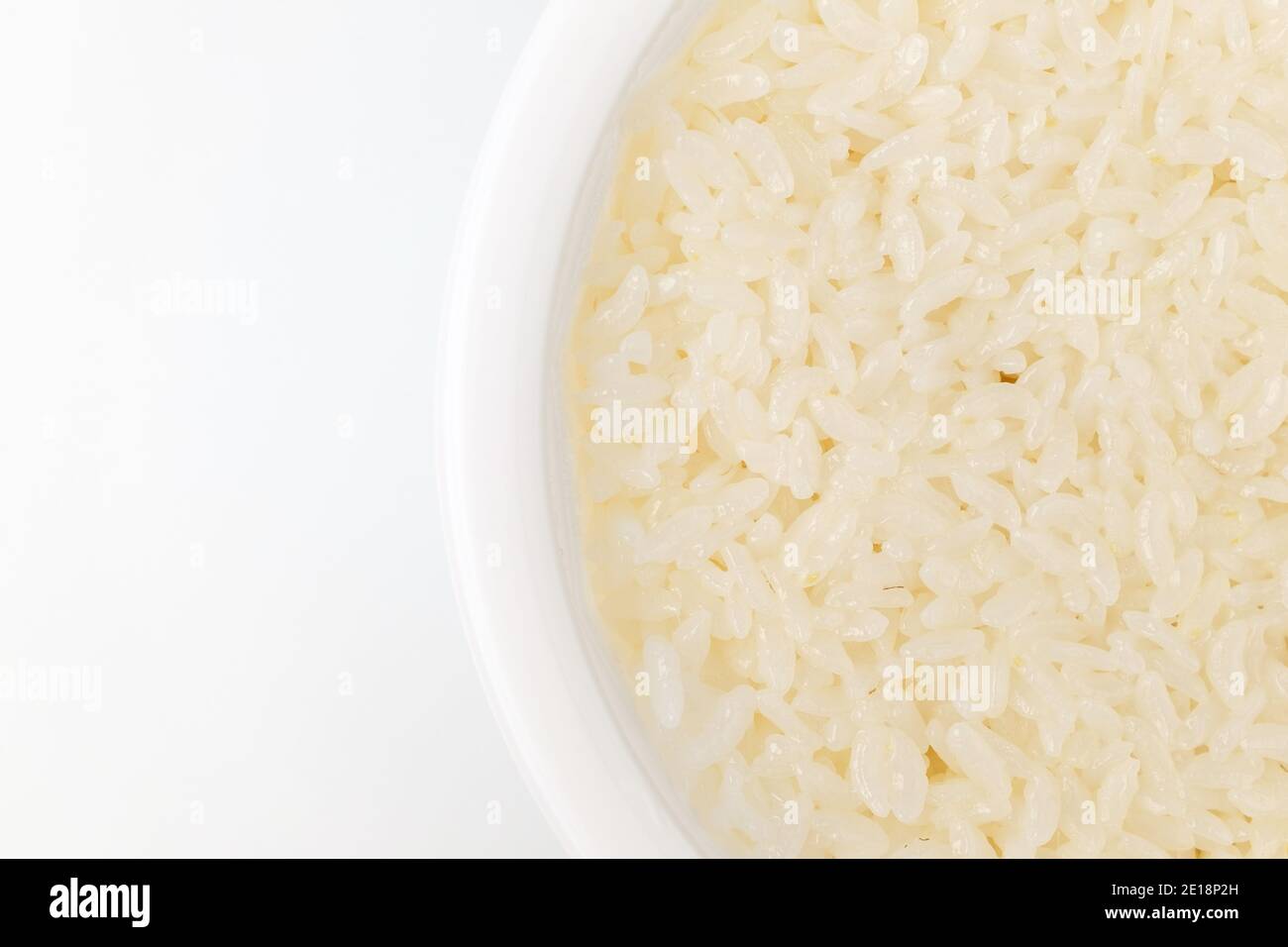 Rice rice on white background Stock Photo - Alamy