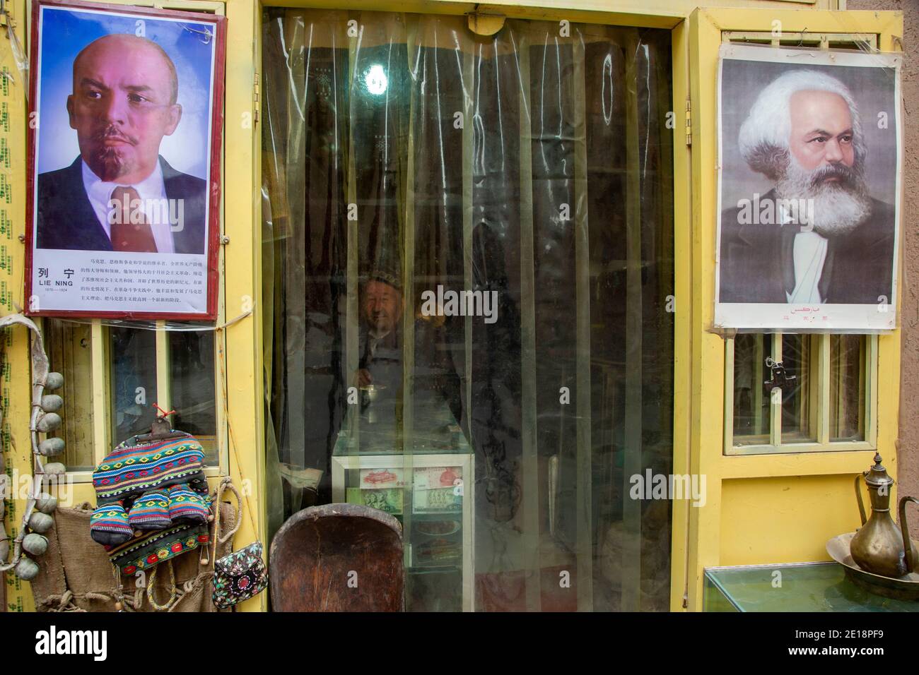 Kashgar, China. 18th of March, 2016 Portraits of Vladimir Lenin and ...