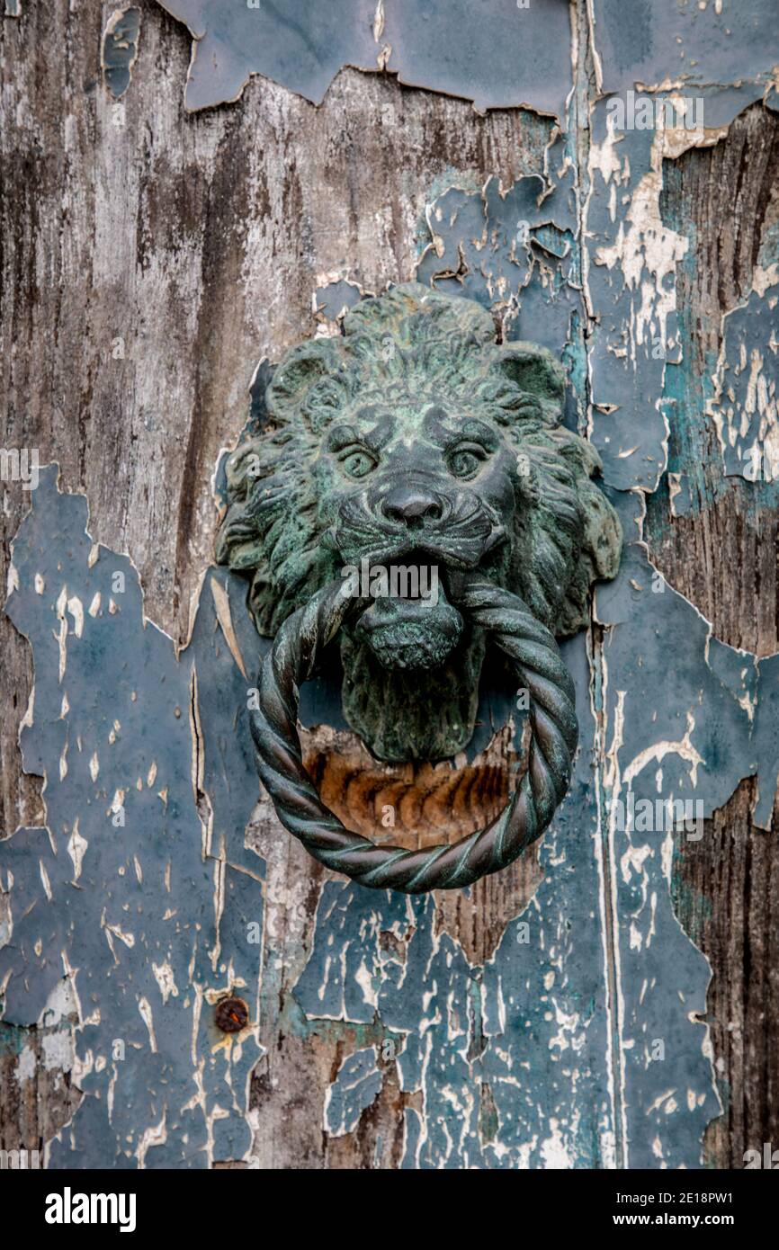 Door and ornate handle or door knocker in Venice Italy. Background of ...