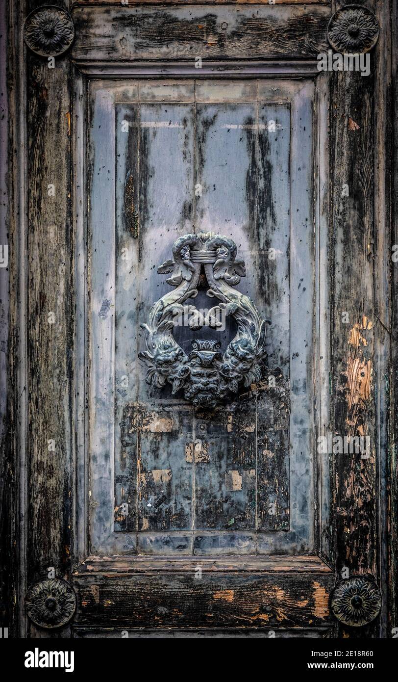 Door and ornate handle in Venice Italy. Background of rustic ...