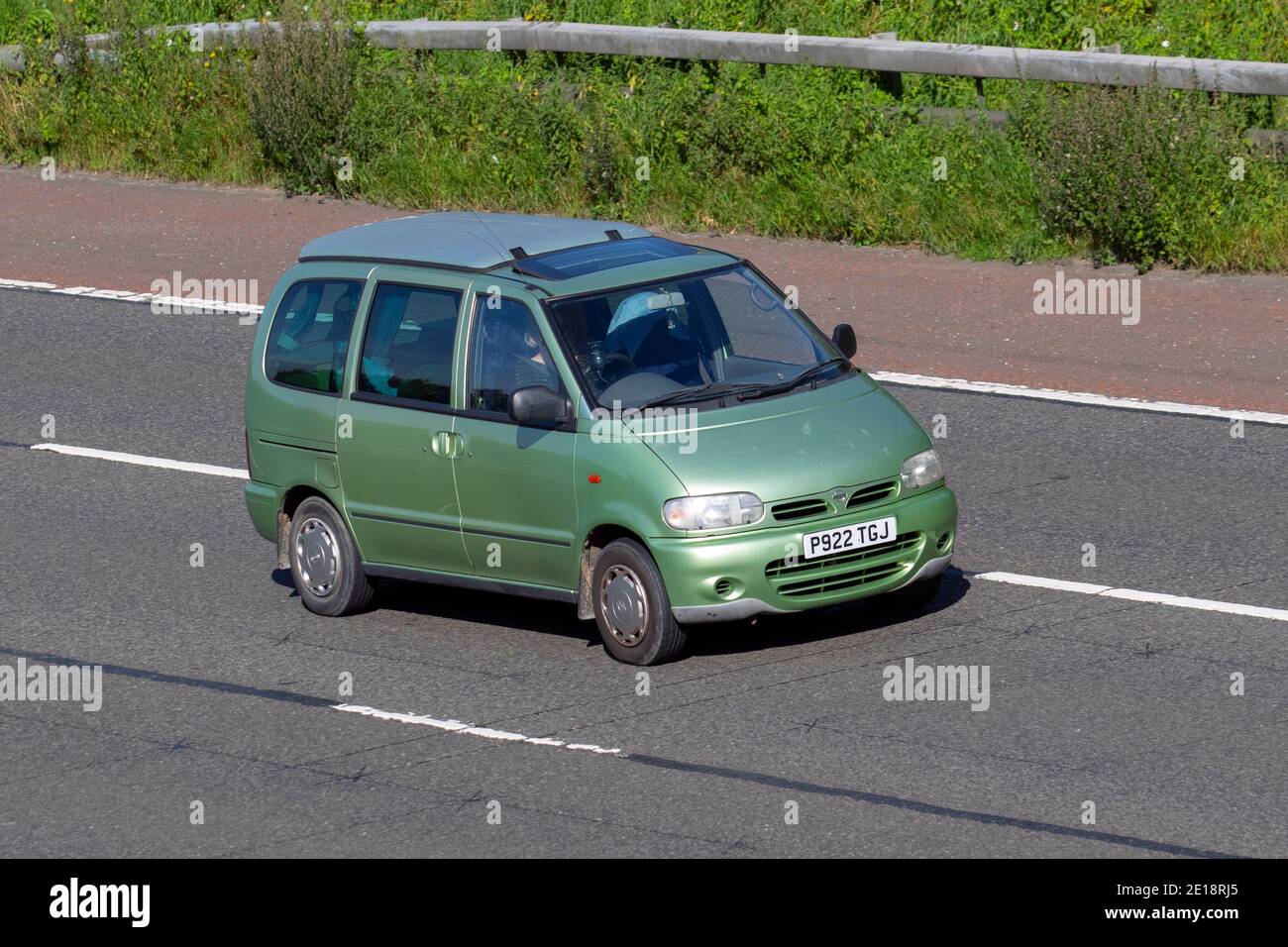 1997 90s green Nissan Serena Excursion window van; Vehicular traffic ...