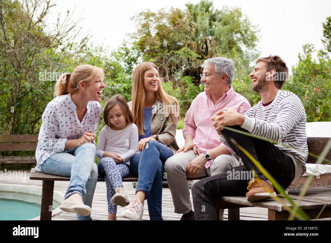 Child on garden bench hi-res stock photography and images - Alamy