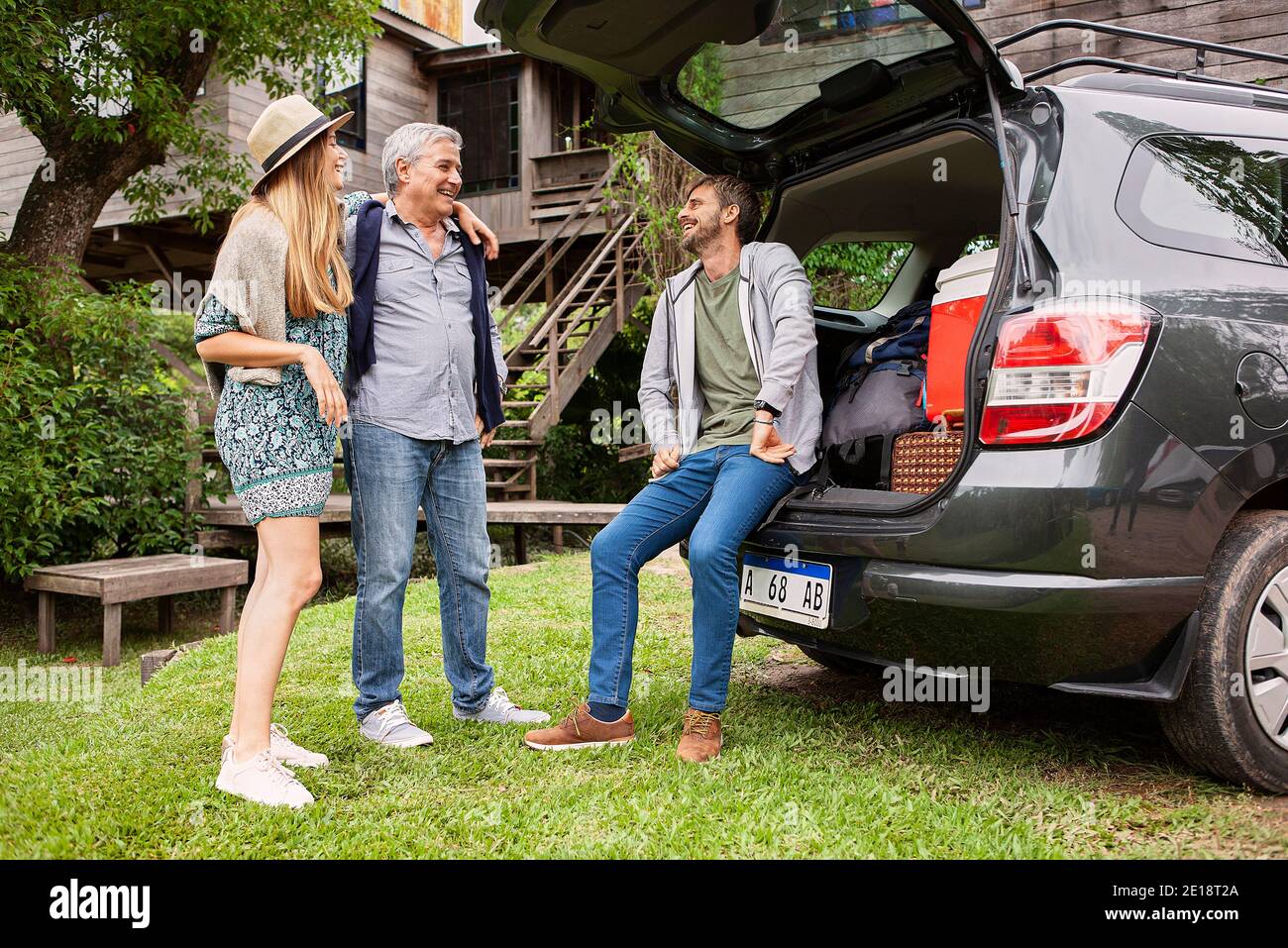 Happy family talking with each other Stock Photo - Alamy