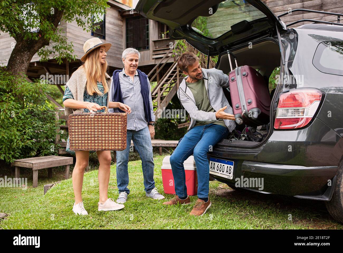 Family going for vacation Stock Photo - Alamy