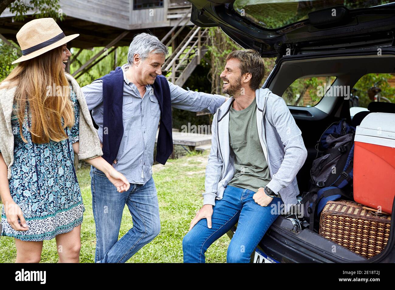 Happy family talking with each other Stock Photo - Alamy