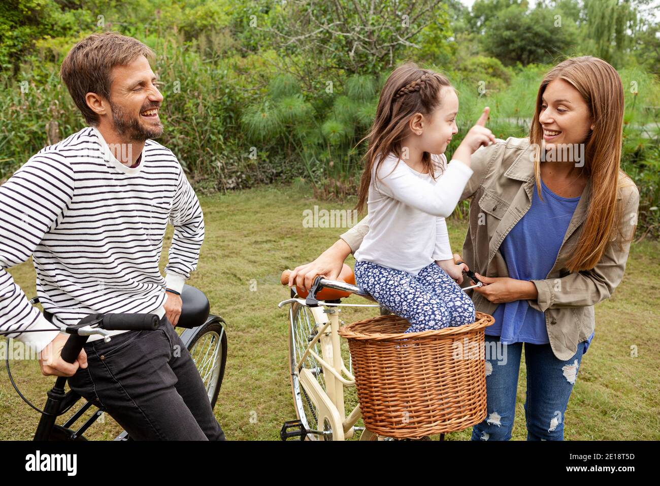 Family having fun in garden Stock Photo - Alamy