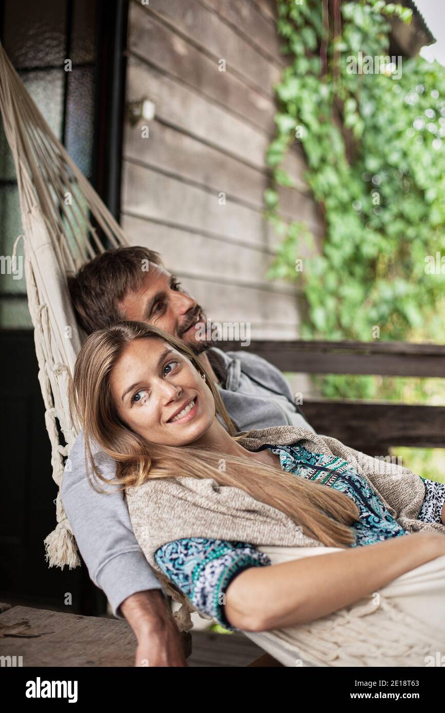 Two people in hammocks hi-res stock photography and images - Alamy