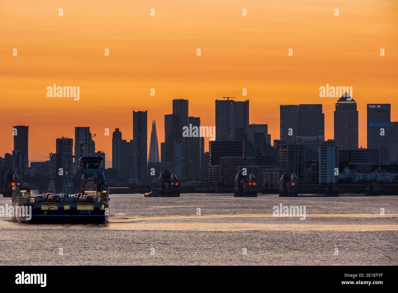 A ferry in Woolwich transfering cars to the other side of the river and ...