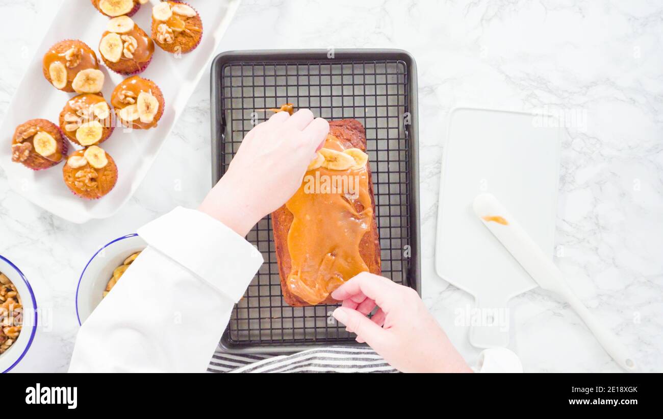 Flat lay. Step by step. Garnishing banana bread loaf with homemade ...