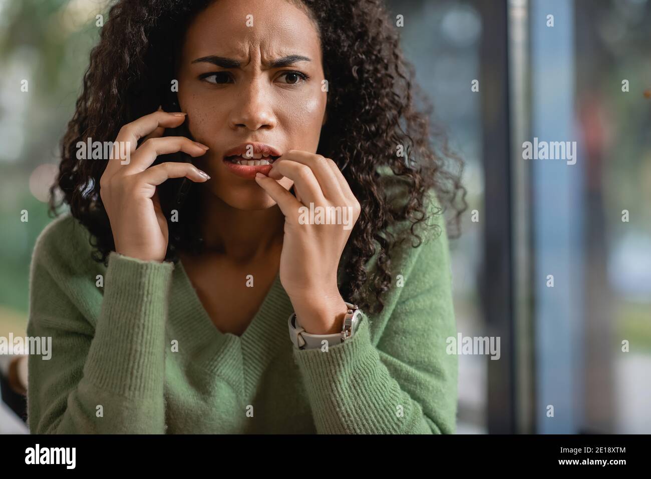 Worried woman in conversation hi-res stock photography and images - Alamy