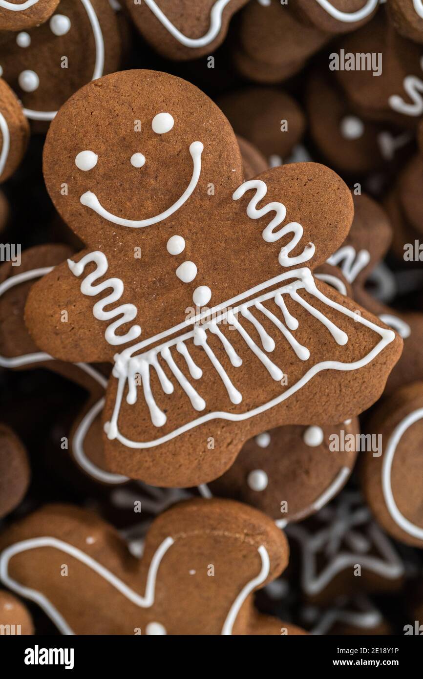 Gingerbread cookies decorated with white royal icing Stock Photo - Alamy