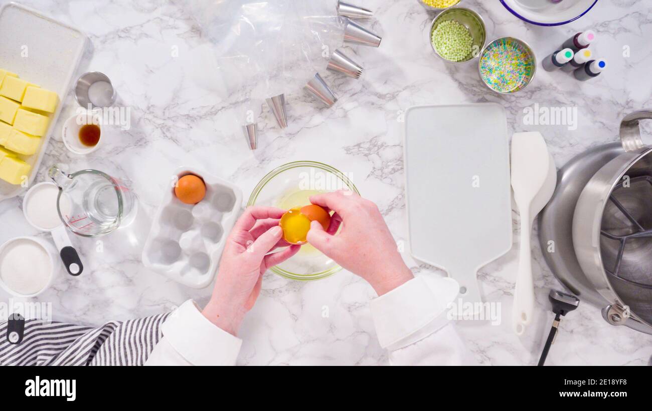 Mixing ingredients to bake sheet cake with Italian buttercream frosting ...