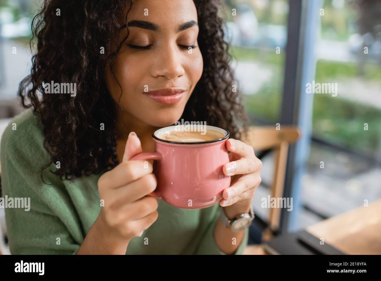 Beautiful woman smelling cup hi-res stock photography and images - Alamy