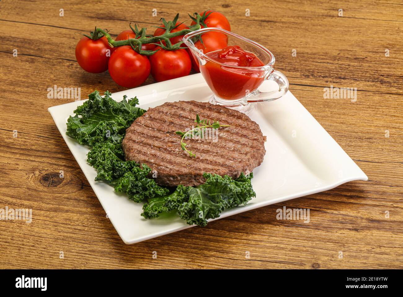 Grilled tasty beef cutlet for burger Stock Photo - Alamy