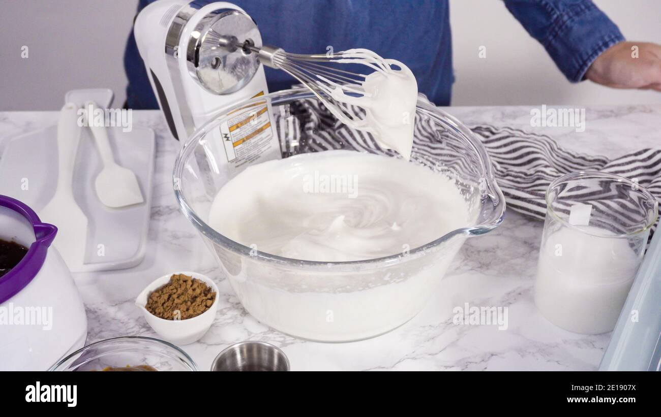 Step by step. Preparing homemade chocolate ice cream in a hand kitchen ...