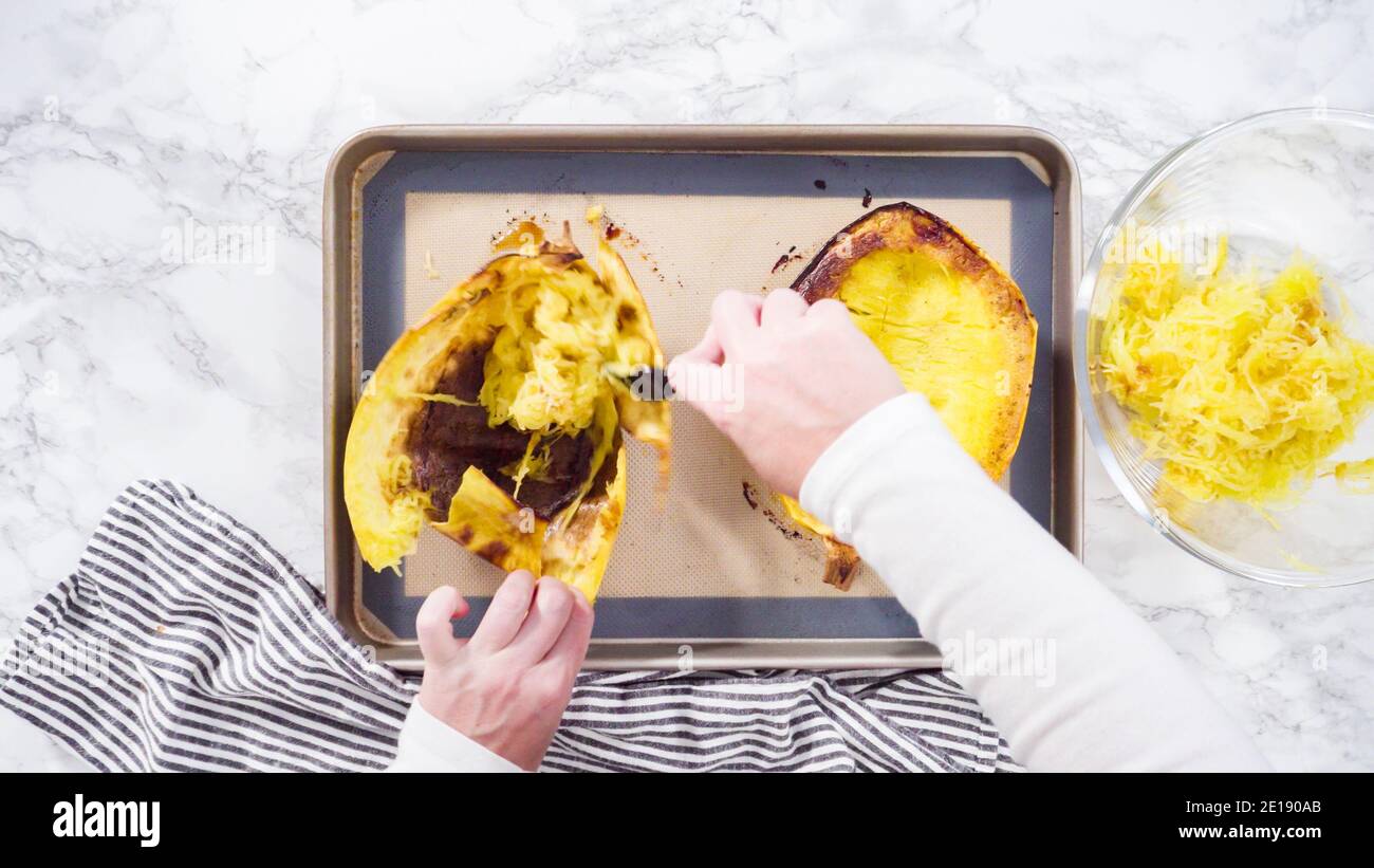 Step by step. Flat lay. Preparing organic spaghetti squash with olive ...