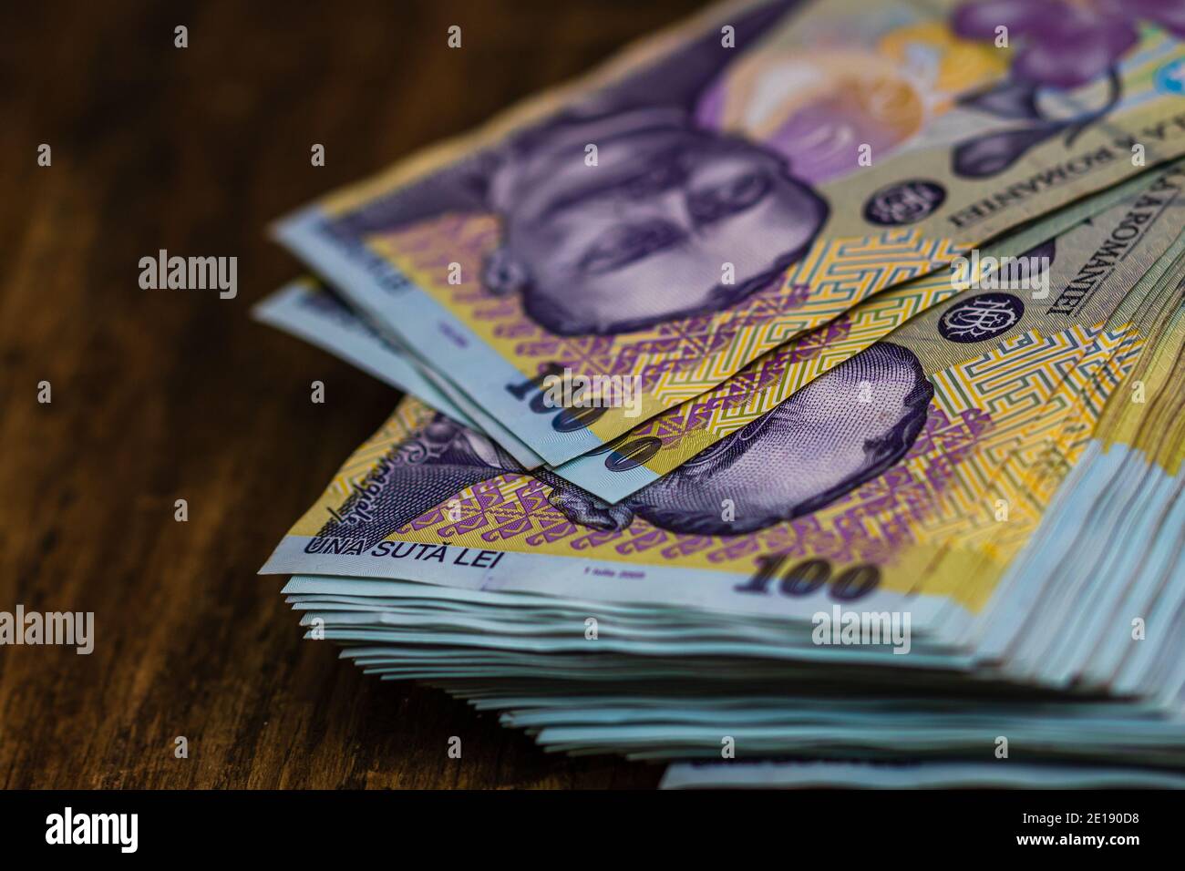 Selective focus on stack of LEI romanian money. Lei banknotes isolated ...