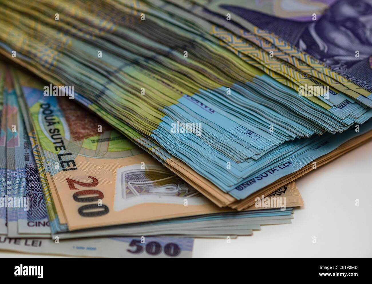 Selective focus on stack of LEI romanian money. Lei banknotes isolated ...