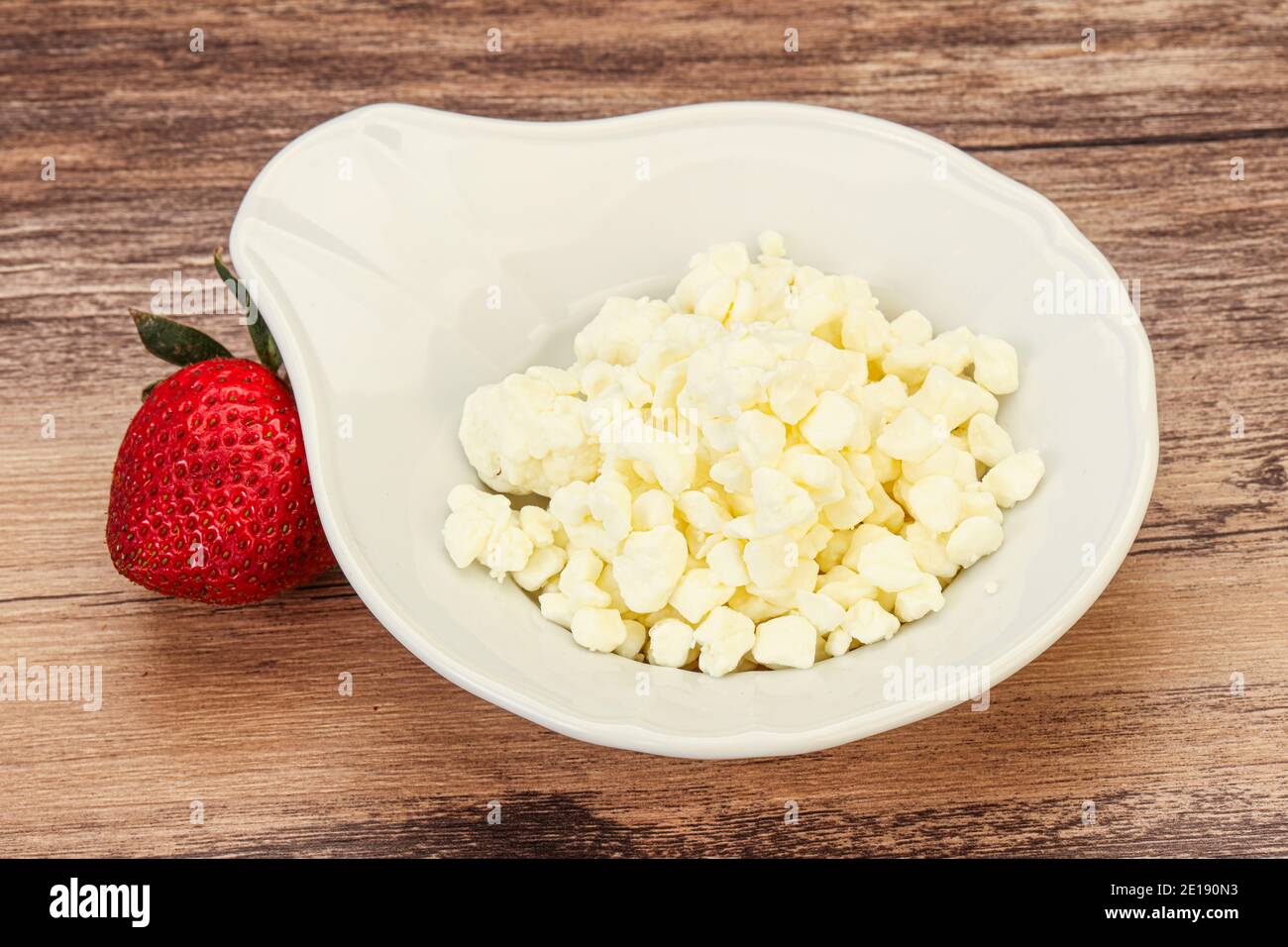 Dietary food - grain cottage cheese in the bowl Stock Photo - Alamy