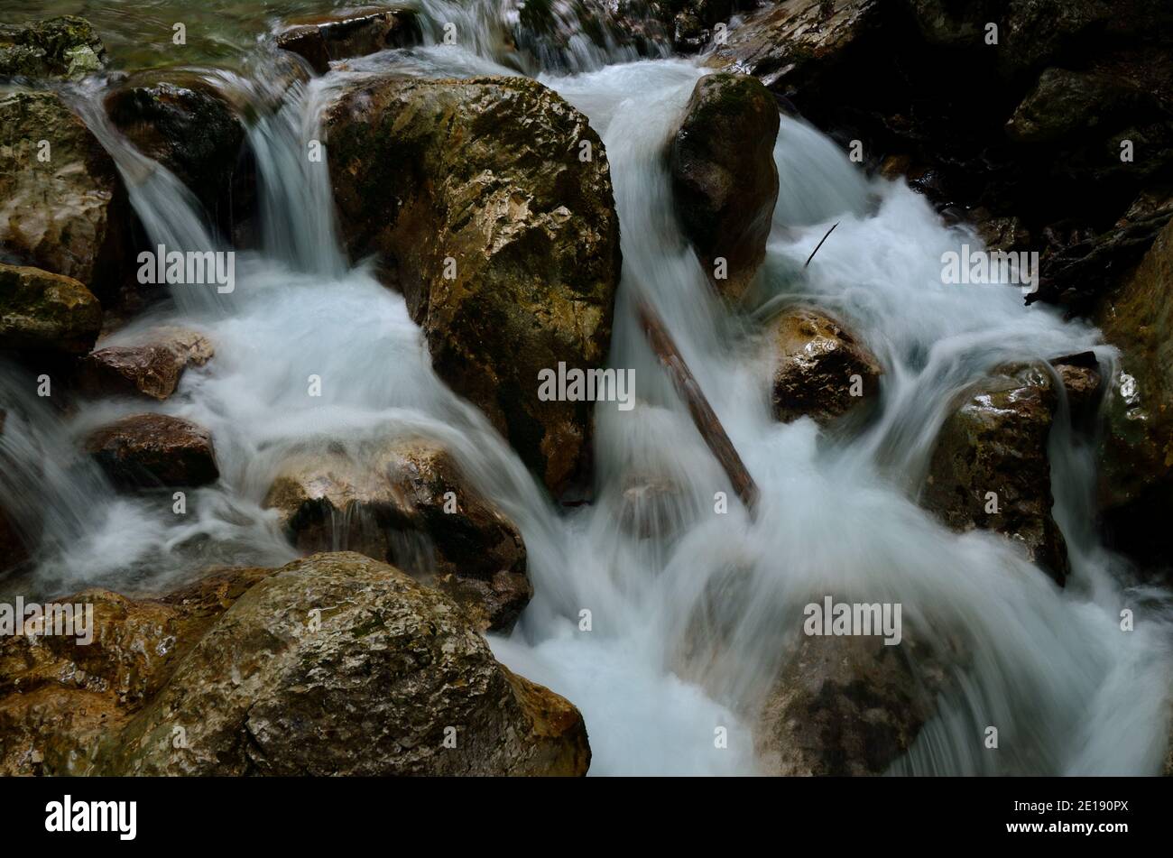 clear cold water between rocks Stock Photo - Alamy