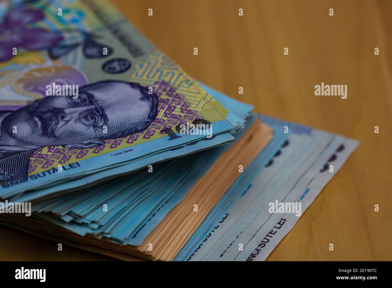 Selective focus on stack of LEI romanian money. Lei banknotes isolated ...