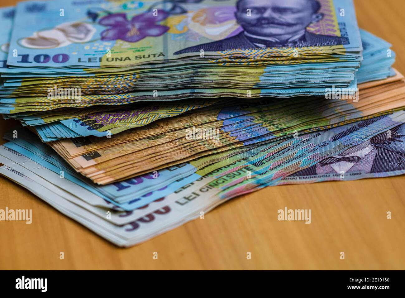 Selective focus on stack of LEI romanian money. Lei banknotes isolated ...