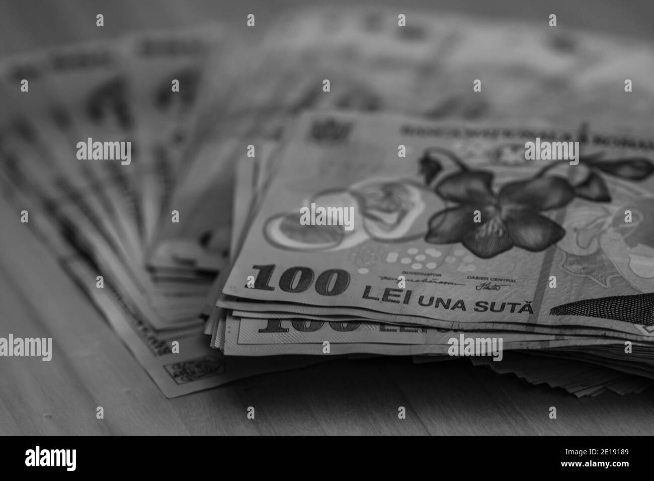 Selective focus on stack of LEI romanian money. Lei banknotes isolated ...