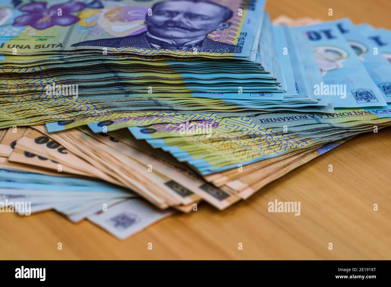 Selective focus on stack of LEI romanian money. Lei banknotes isolated ...
