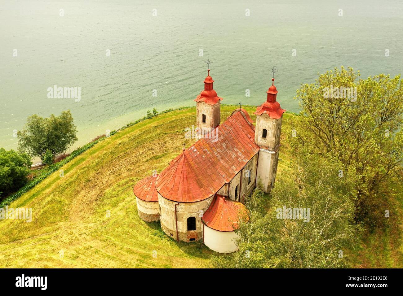Aerial view of the historic church at the Velka Domasa dam in Slovakia ...