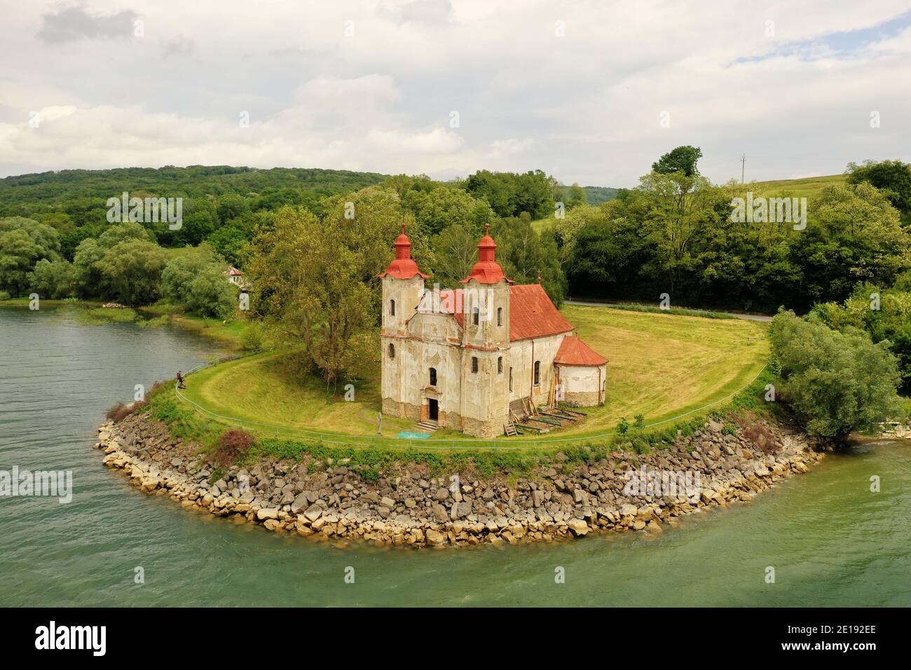 Aerial view of the historic church at the Velka Domasa dam in Slovakia ...