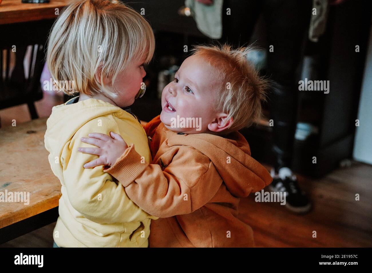 Boys cuddling hi-res stock photography and images - Alamy