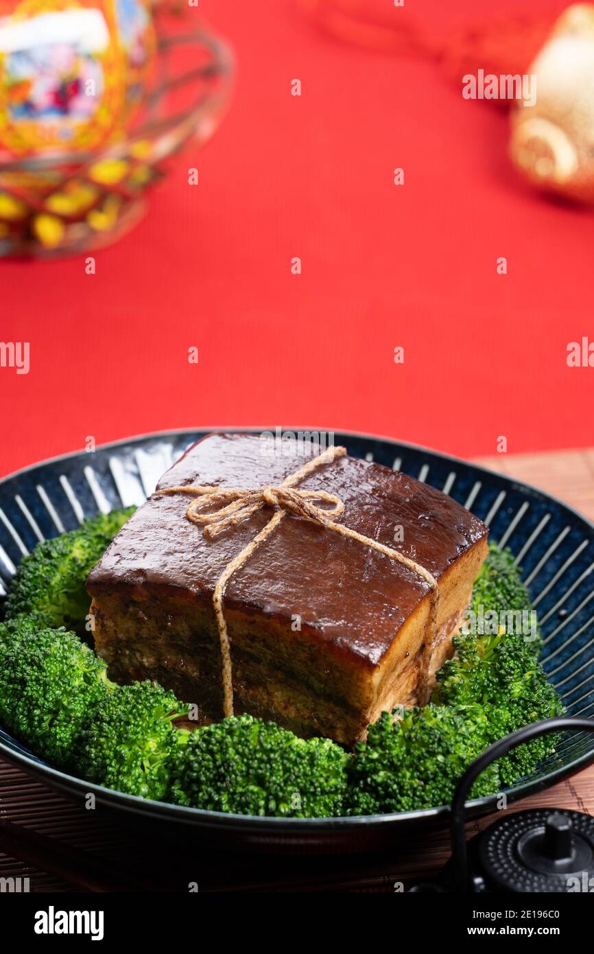 Dong Po Rou (Dongpo pork meat) in a beautiful blue plate with green ...