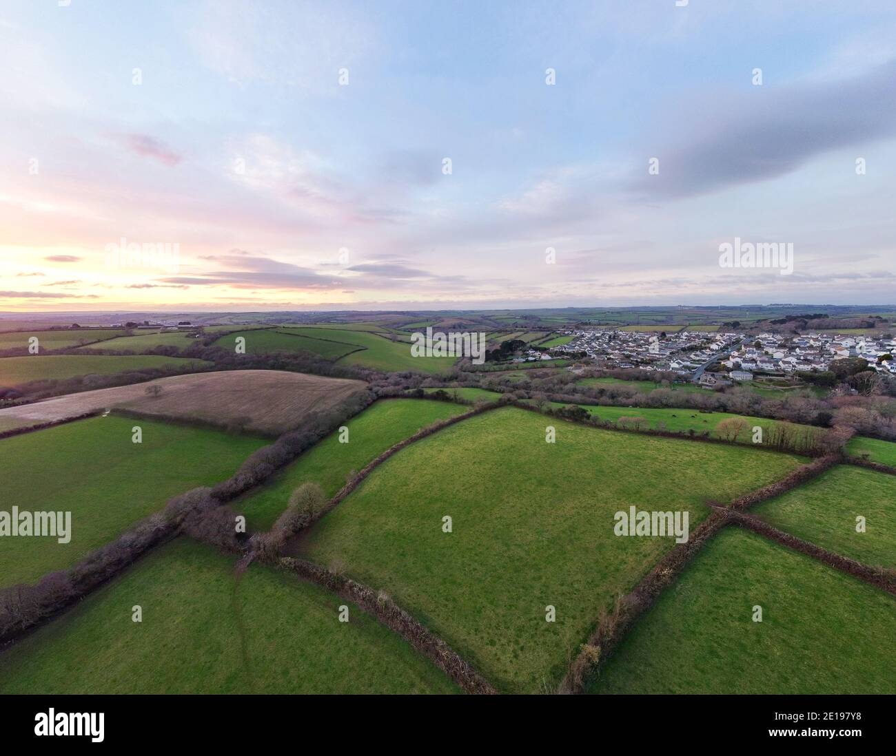 aerial views at sunset near the village of probus cornwall England uk ...