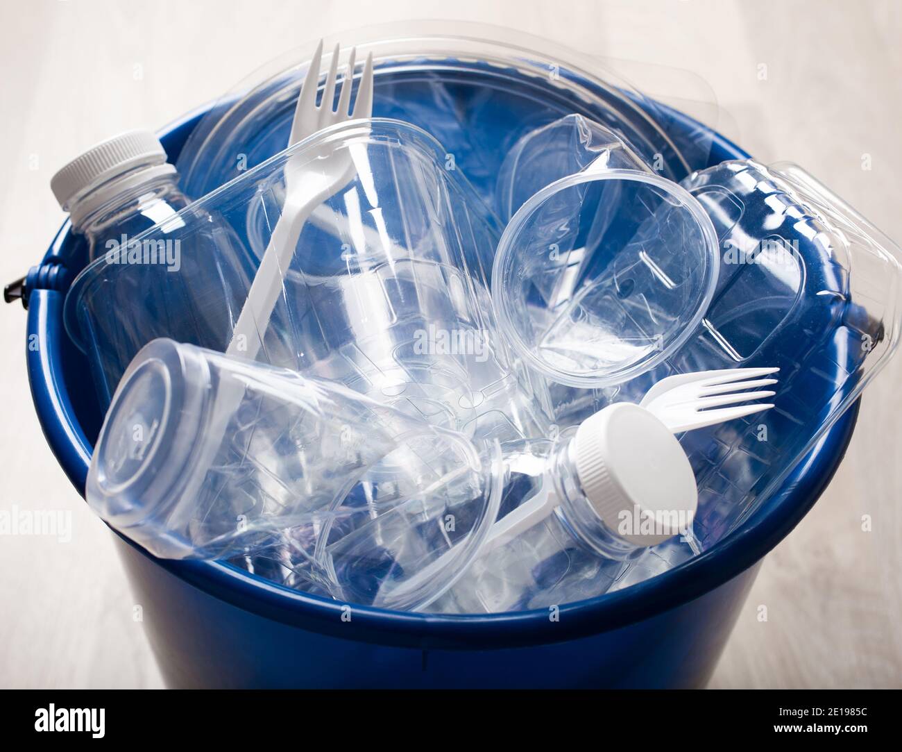 clean recyclable plastic bottles, containers, cups in garbage bin ...