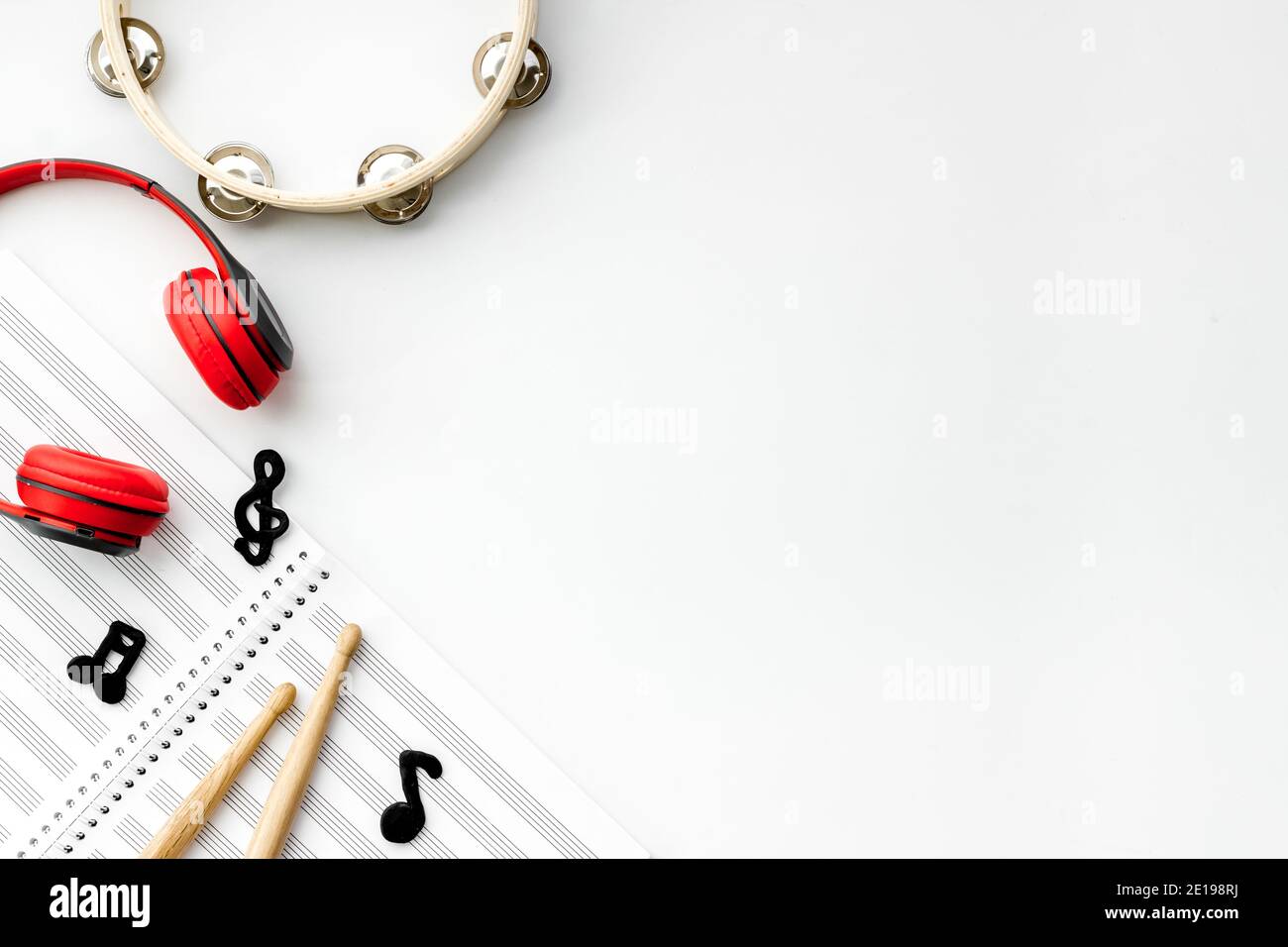 Flat lay of music background - instrument with sheet music, top view ...
