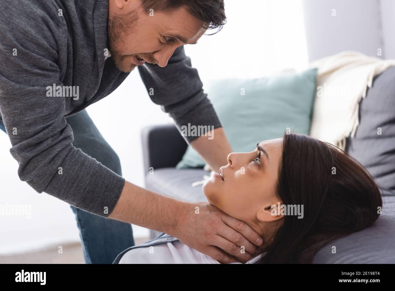 Man choking hi-res stock photography and images - Alamy