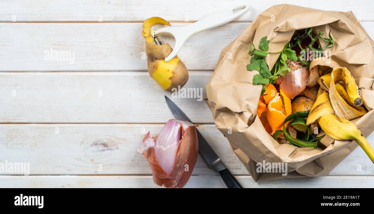 Composting concept - kitchen leftovers in paper bag Stock Photo - Alamy