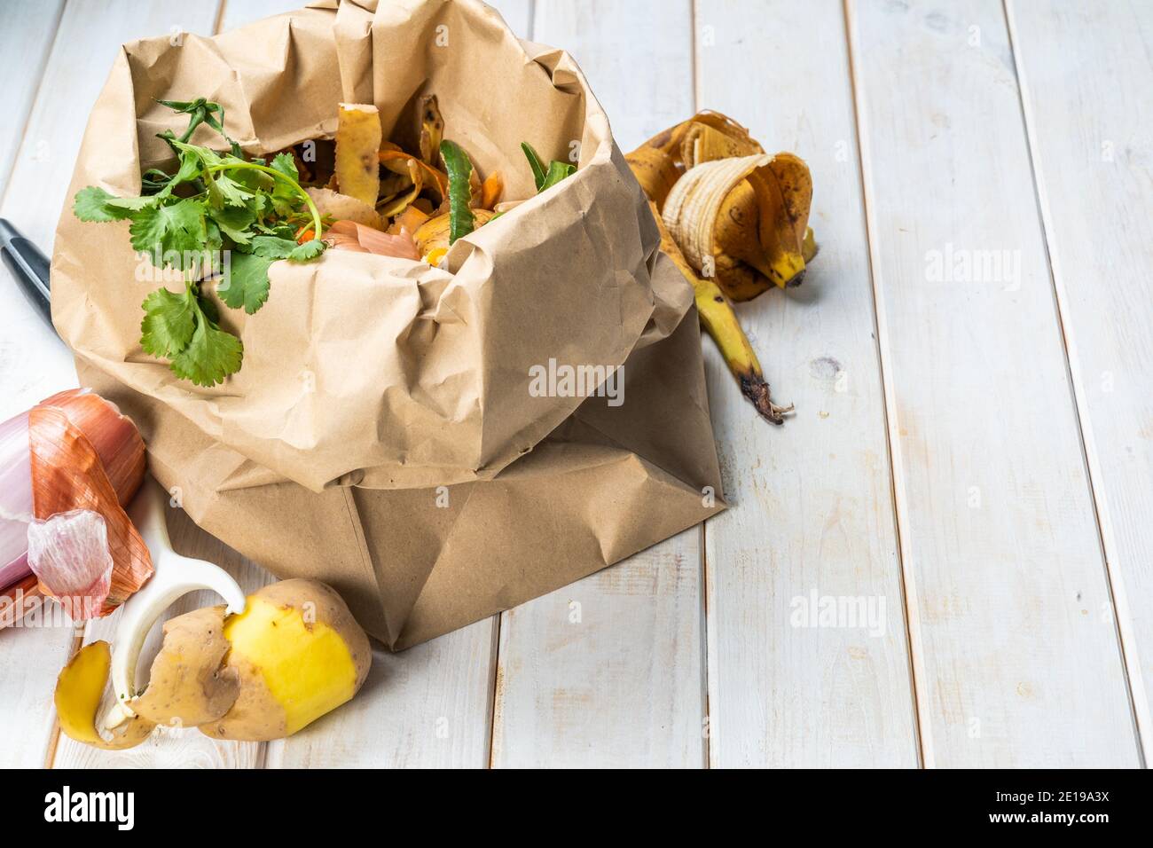 Composting concept - kitchen leftovers in paper bag Stock Photo - Alamy