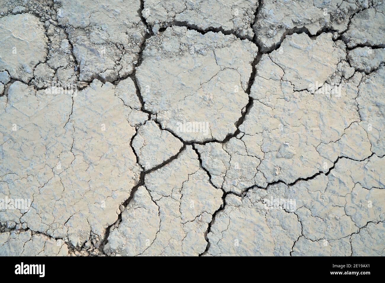 Above view of split soil in large parts. Concept of drought cracked ...