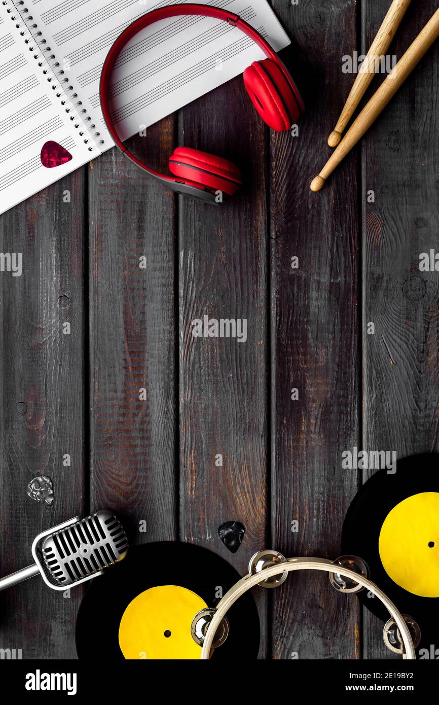 Flat lay of music background - instrument with sheet music, top view ...