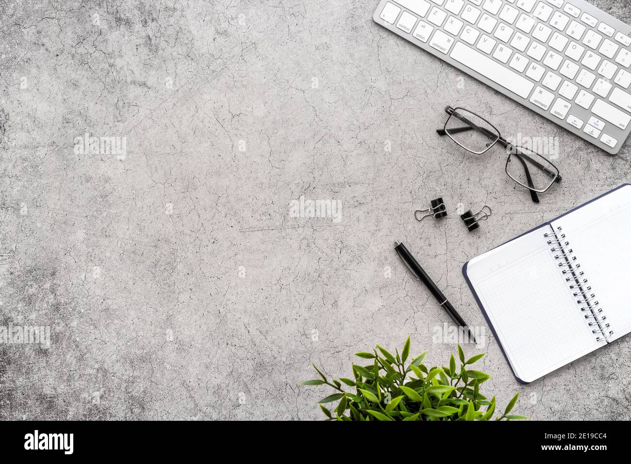 Flat lay workplace office desktop with keyboard and office supplies ...