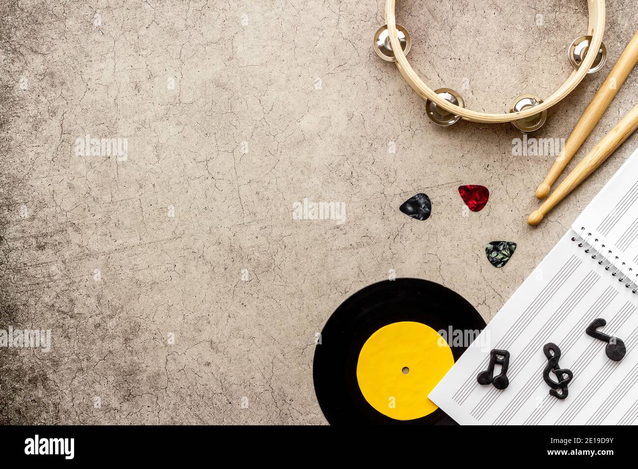Flat lay of music background - instrument with sheet music, top view ...