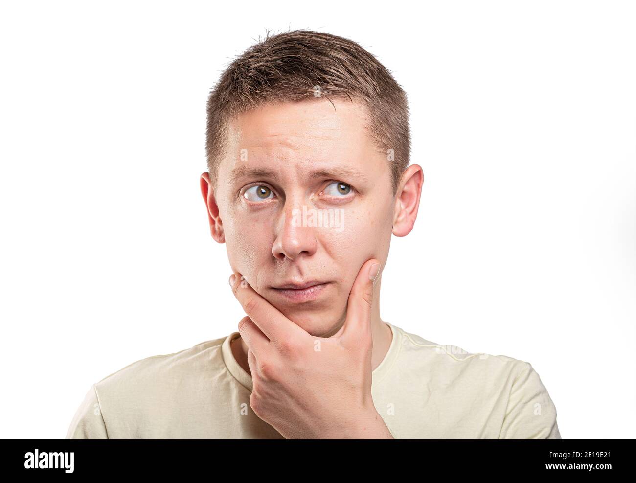 Funny young guy portrait isolated on a white background Stock Photo - Alamy