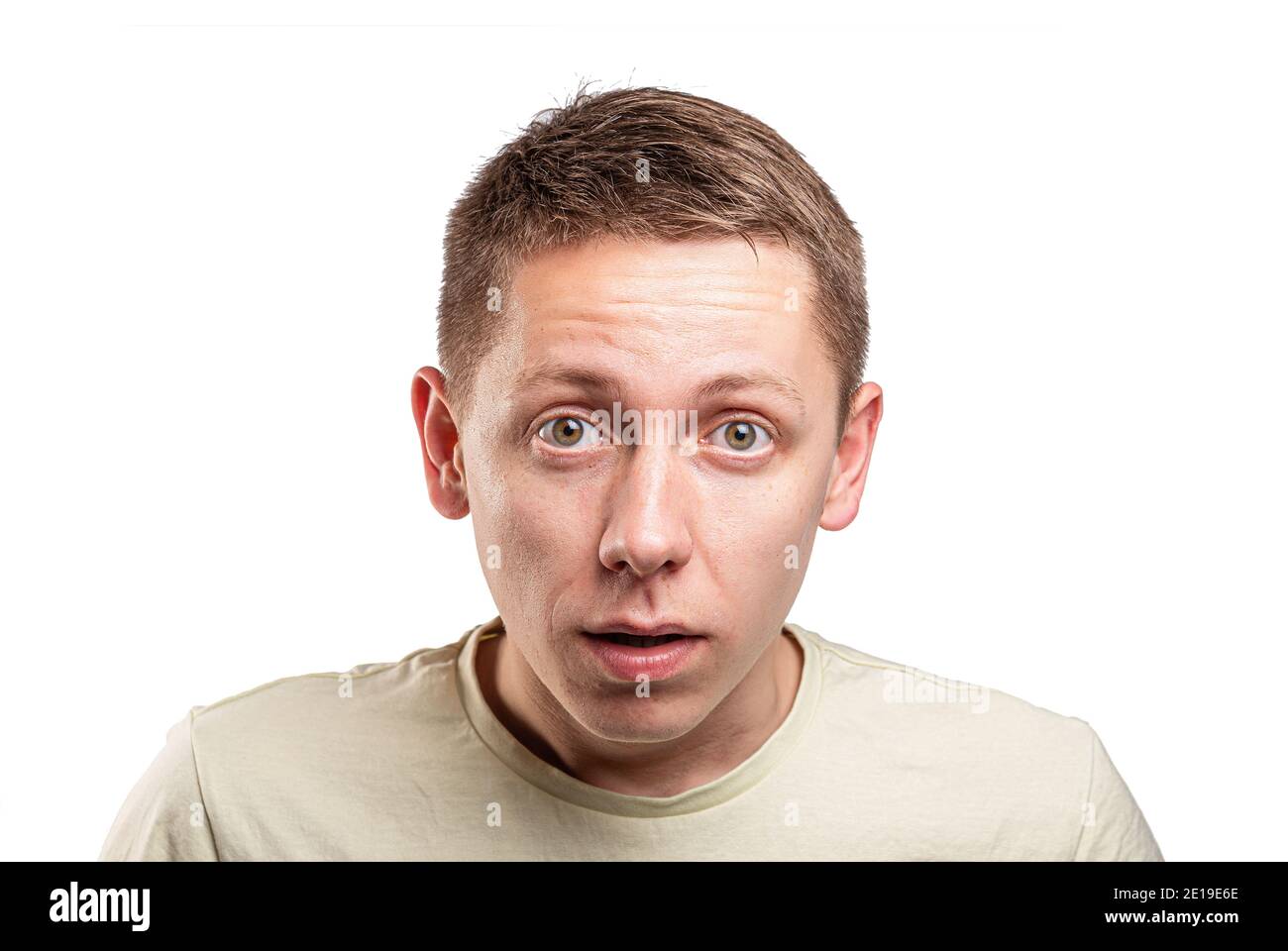 Funny young guy portrait isolated on a white background Stock Photo - Alamy