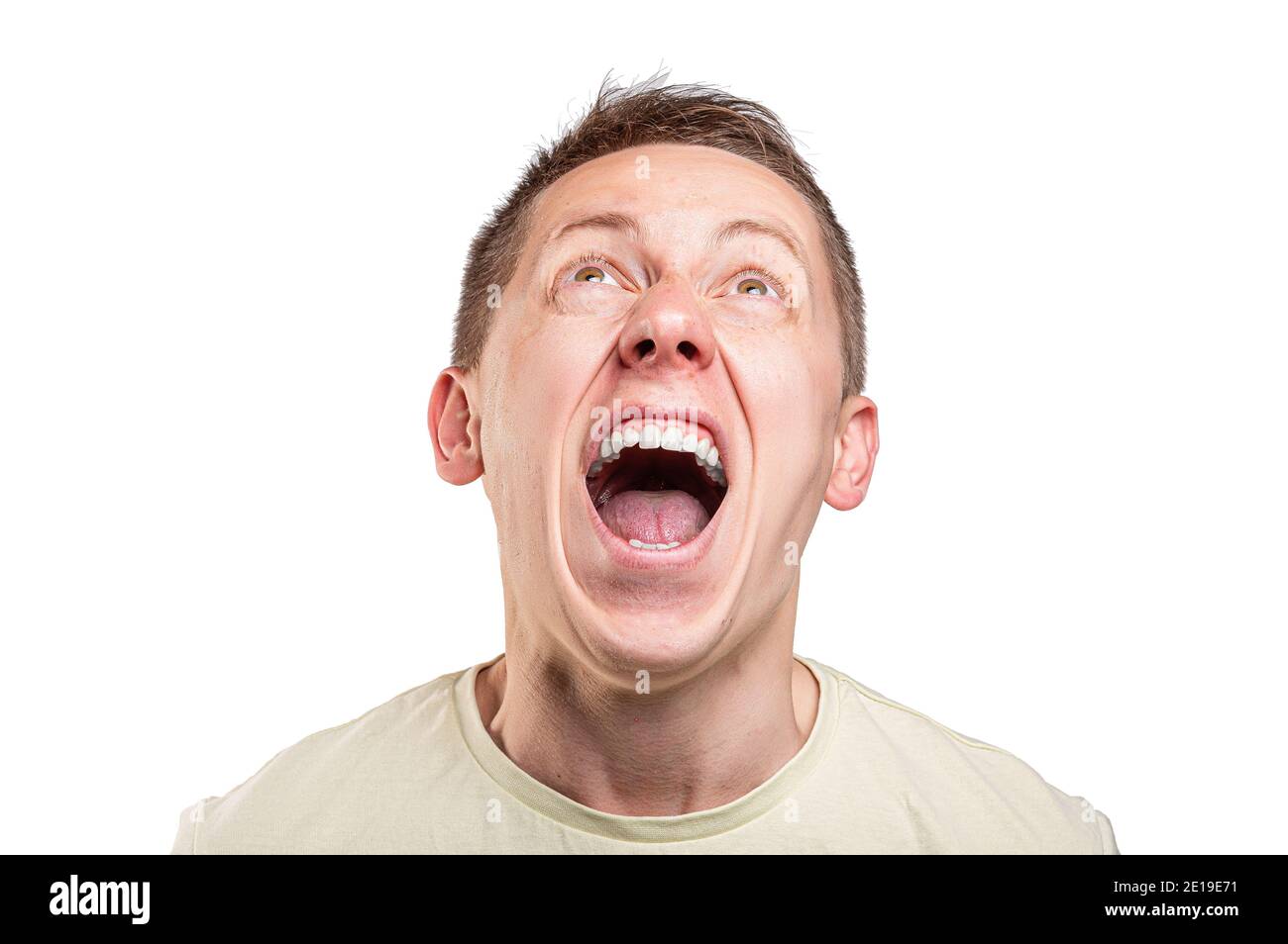 Funny young guy portrait isolated on a white background Stock Photo - Alamy